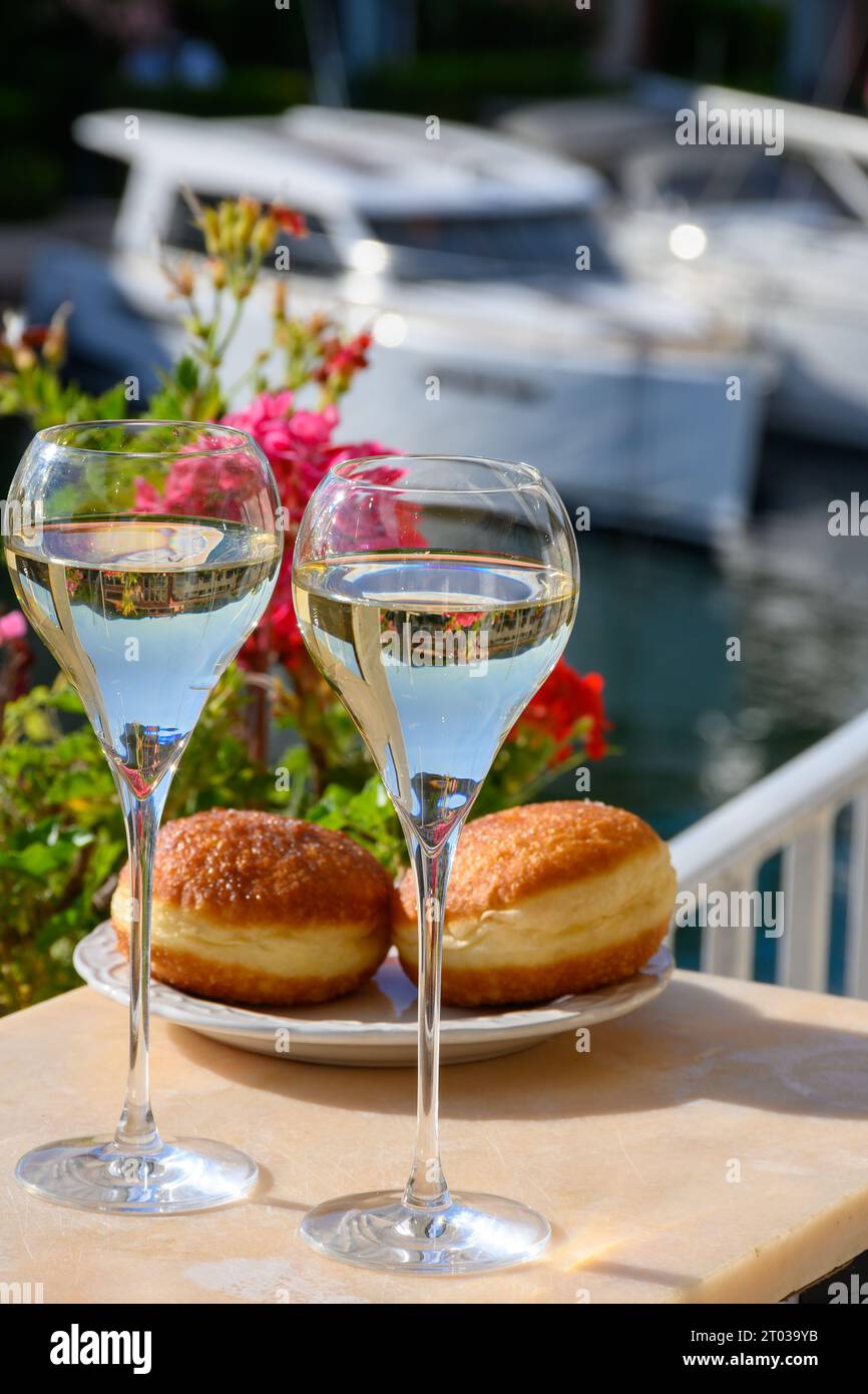 Drinking of French brut champagne sparkling wine with sweet apple ...