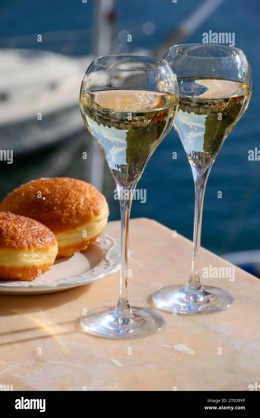 Drinking of French brut champagne sparkling wine with sweet apple ...