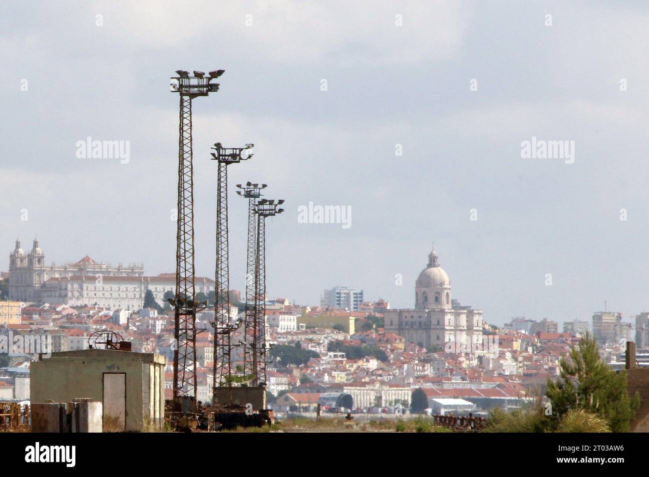 A city view of tall modern buildings and a unique architectural dome ...