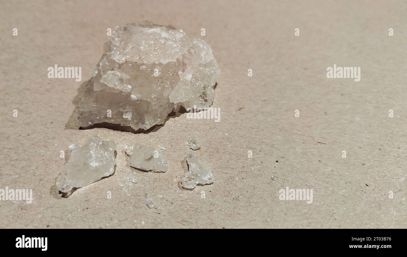 mineral chunk of sodium chloride or common salt with smaller chunks ...