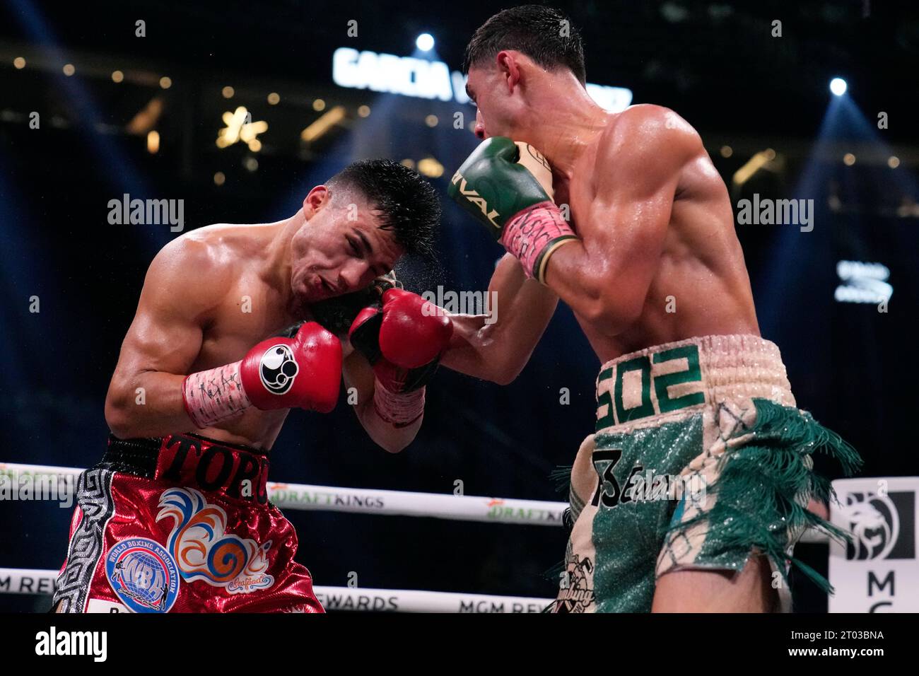 Elijah Garcia lands a right to Armando Resendiz during their ...