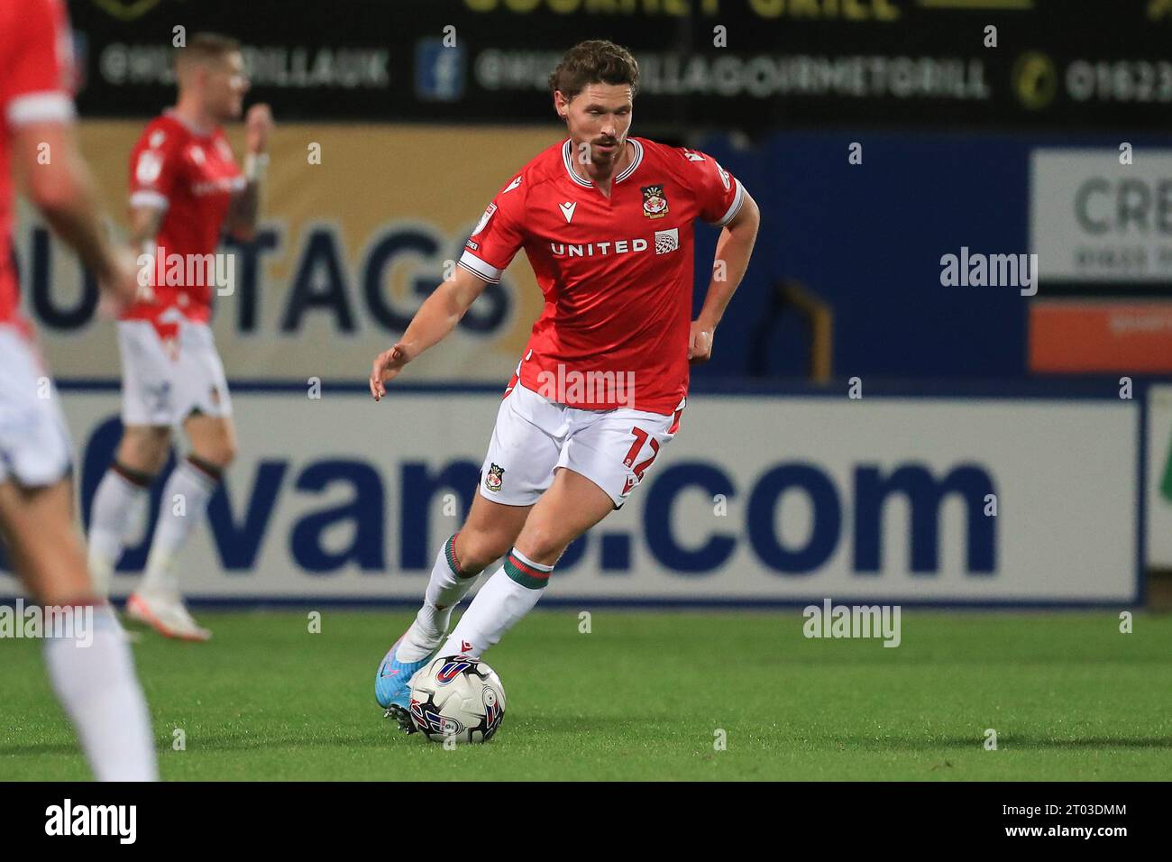 Mansfield, UK. 03rd Oct, 2023. Wrexham midfielder George Evans (12 ...