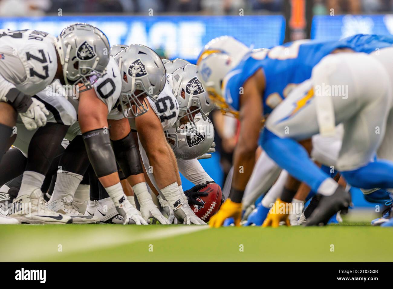 The Las Vegas Raiders line up against the Los Angeles Chargers in an ...