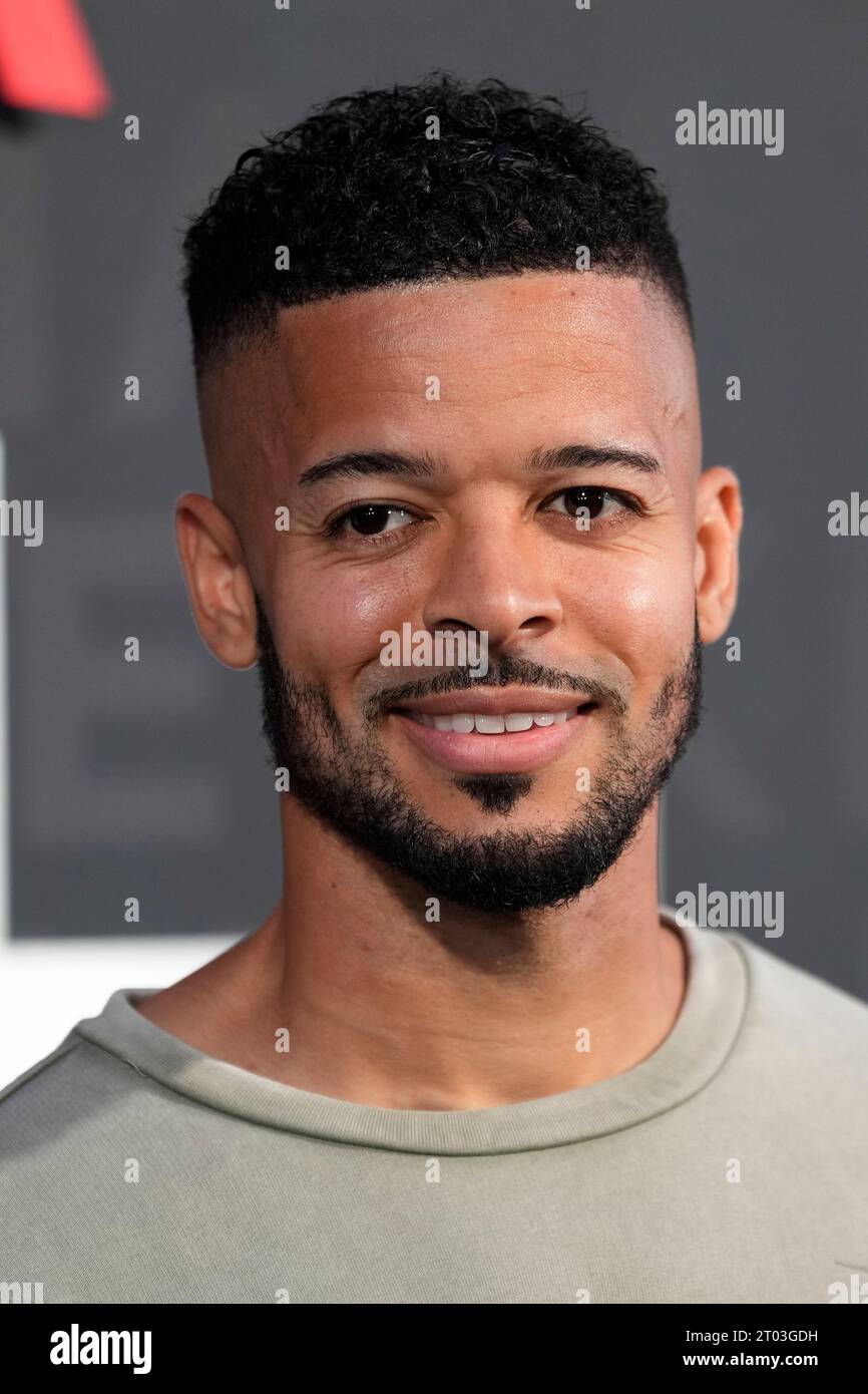 Jeremy Lynch poses for photographers upon arrival at the premiere of ...