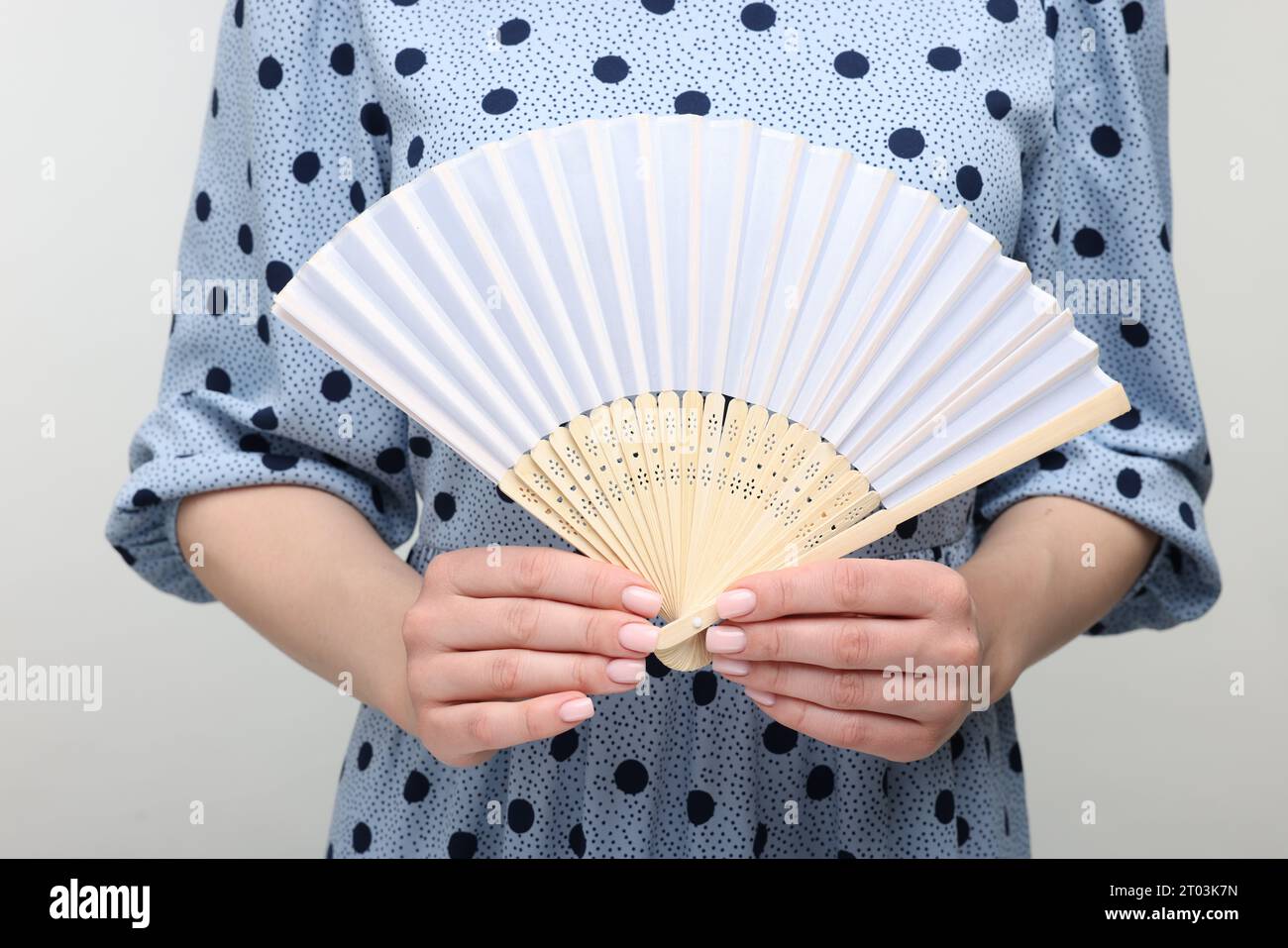 Woman fanning hands hi-res stock photography and images - Alamy