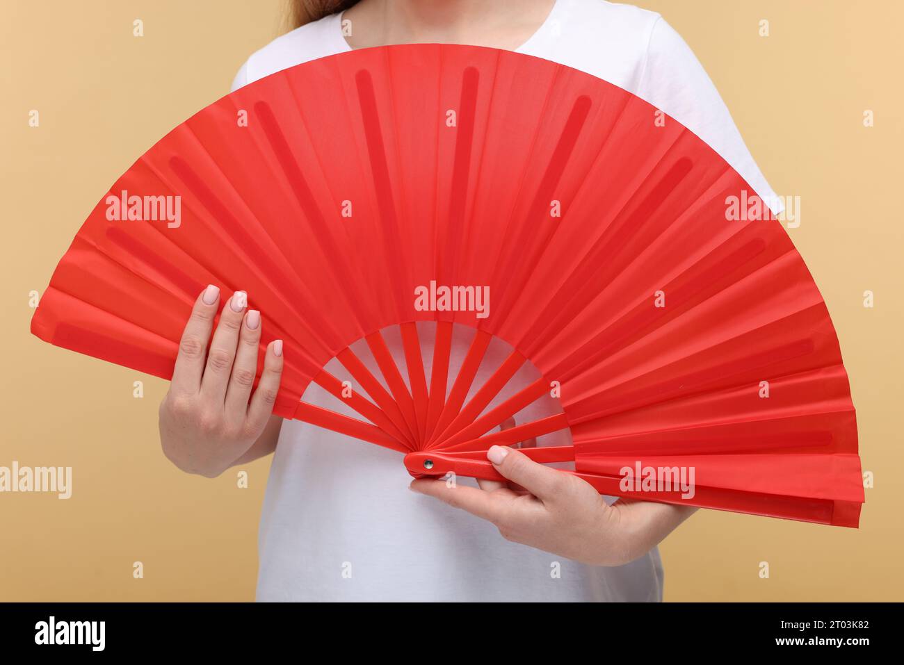 Woman fanning hands hi-res stock photography and images - Alamy
