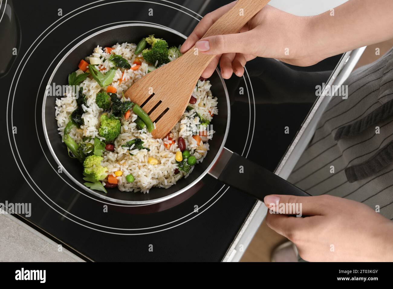 Woman tasty rice beans hi-res stock photography and images - Alamy