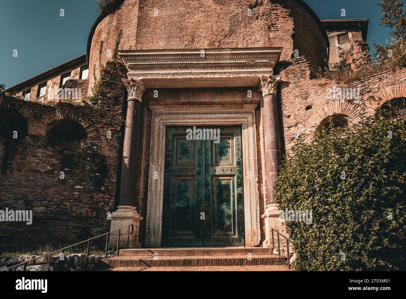 Rustic green door of the Temple wall of Romulus at the Roman Forum in ...