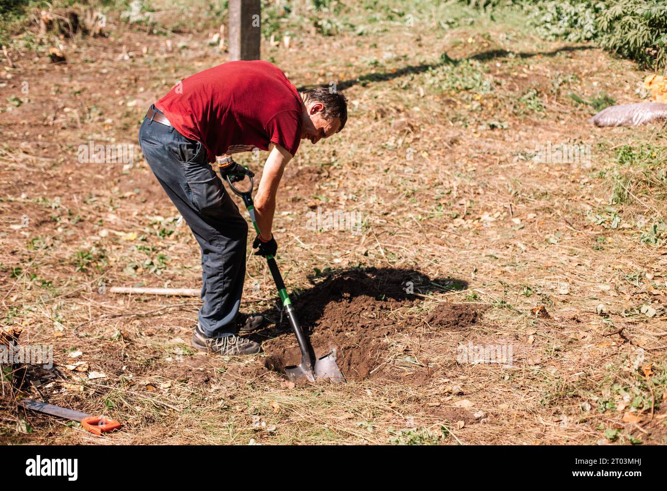 Farmer digging a hole hi-res stock photography and images - Alamy