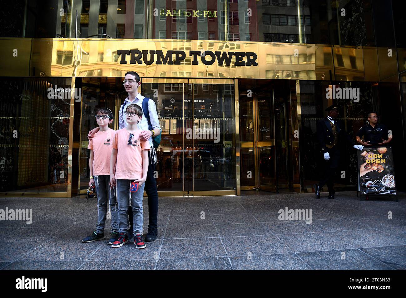 New York, USA. 03rd Oct, 2023. A family pose for pictures outside of ...