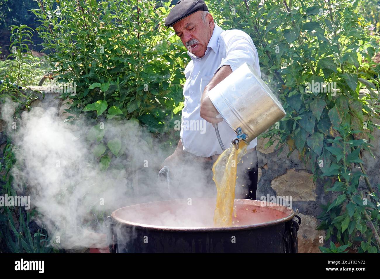 Diyarbakir, Turkey. 01st Oct, 2023. A villager is seen emptying boiling ...