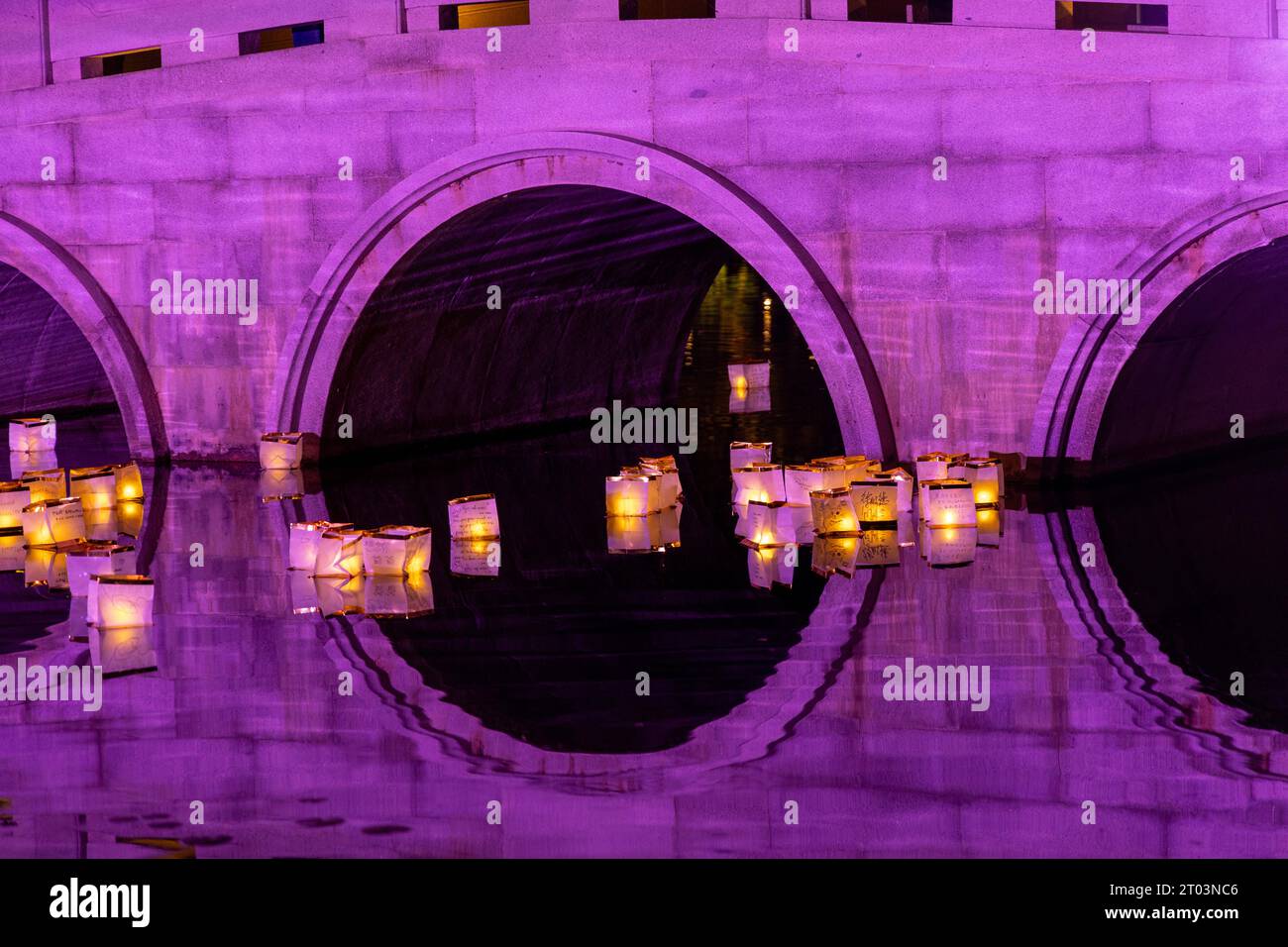 Chinese lanterns floating below a traditional Chinese bridge Stock ...