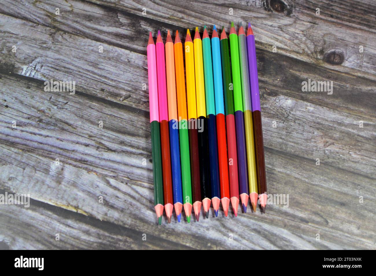 wood color pencils of different colors for painting isolated on wooden ...