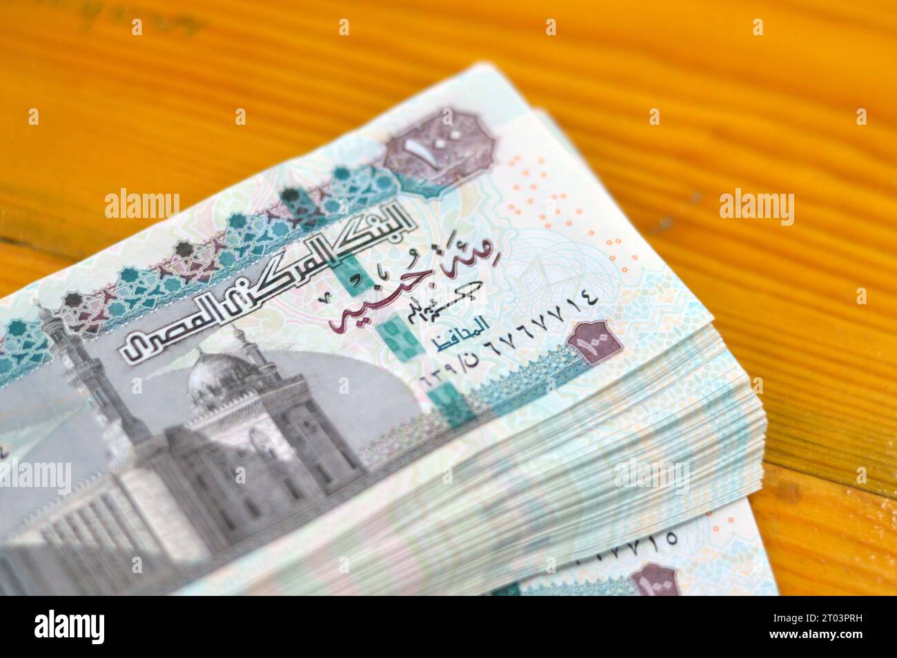 Stack of Egyptian currency of 100 EGP LE 2023 one hundred Egyptian ...