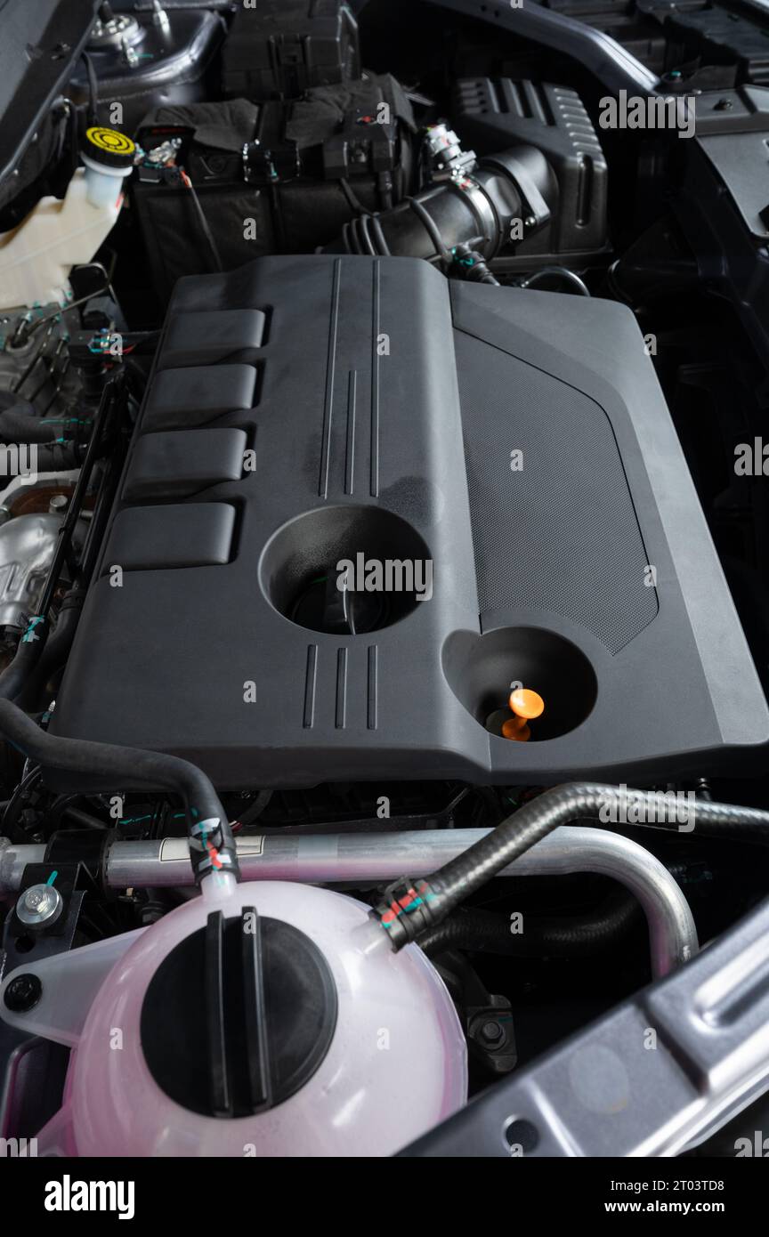 Motor of new SUV car with black plastic cover and cooling system Stock ...