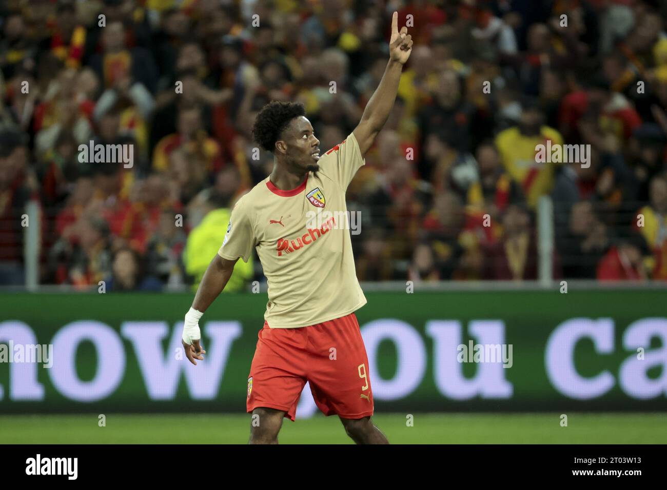 Sepe Elye Wahi of Lens celebrates his goal during the UEFA Champions ...