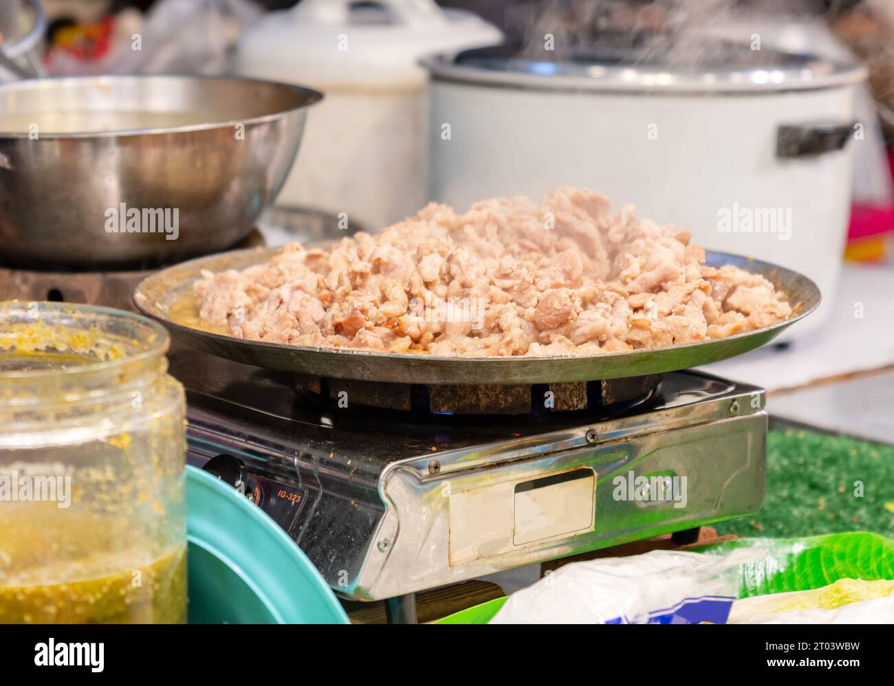 Steamed crab roe in steamer with sea food sauce in glass jar on street ...
