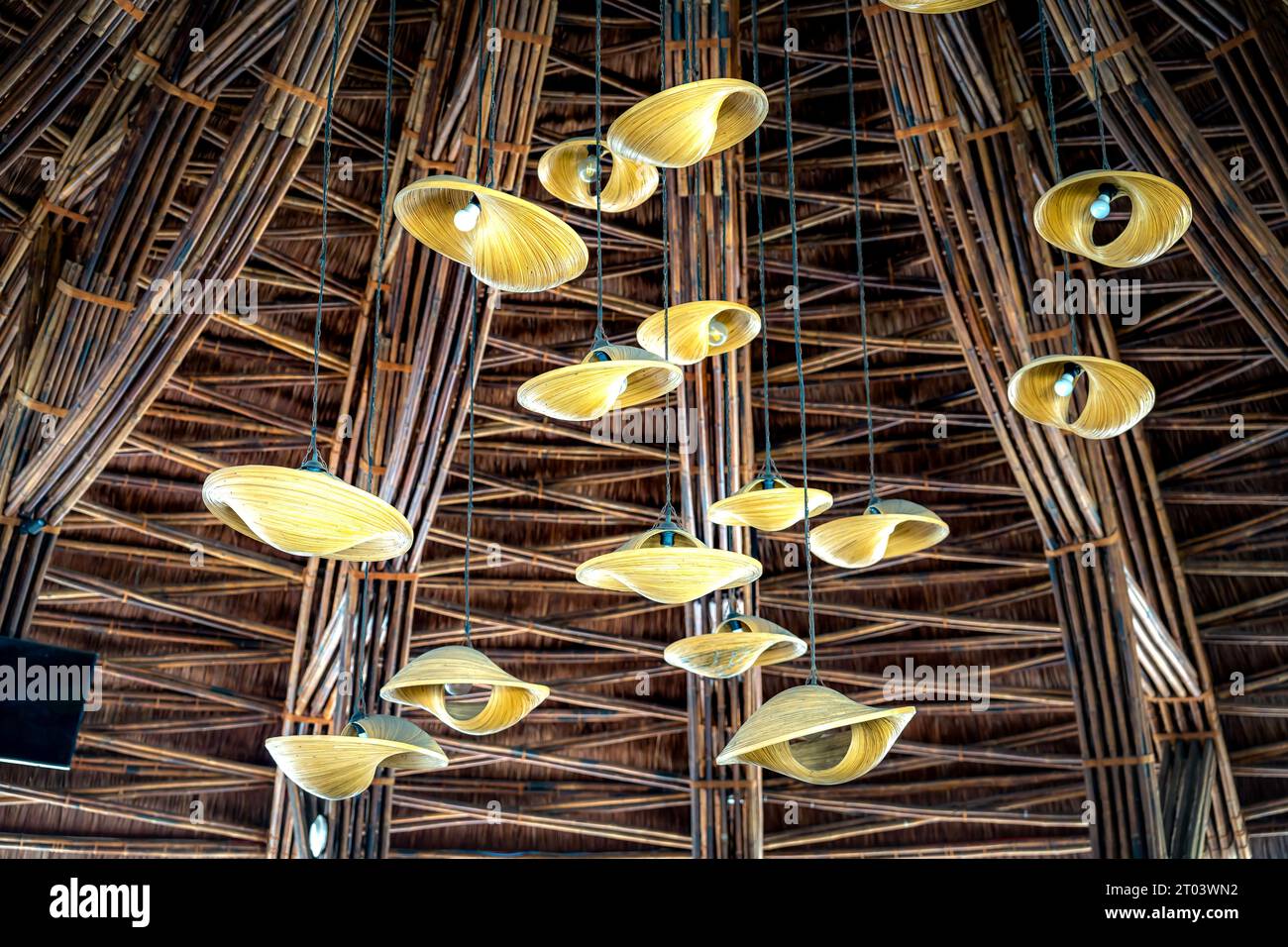Admire the beautiful hand-made chandeliers hanging in a luxurious cafe ...