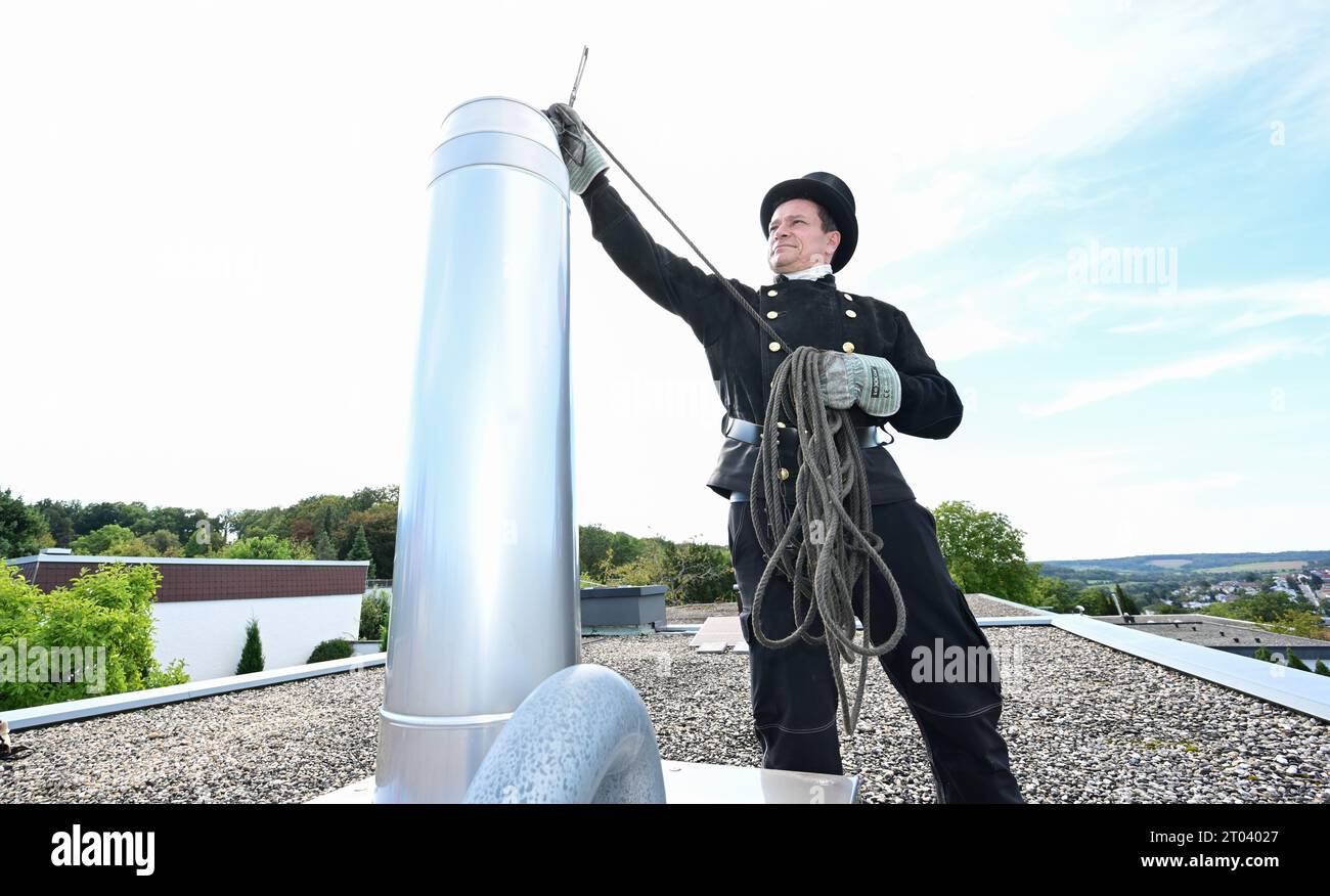 Maulbronn, Germany. 27th Sep, 2023. Master chimney sweep Markus ...