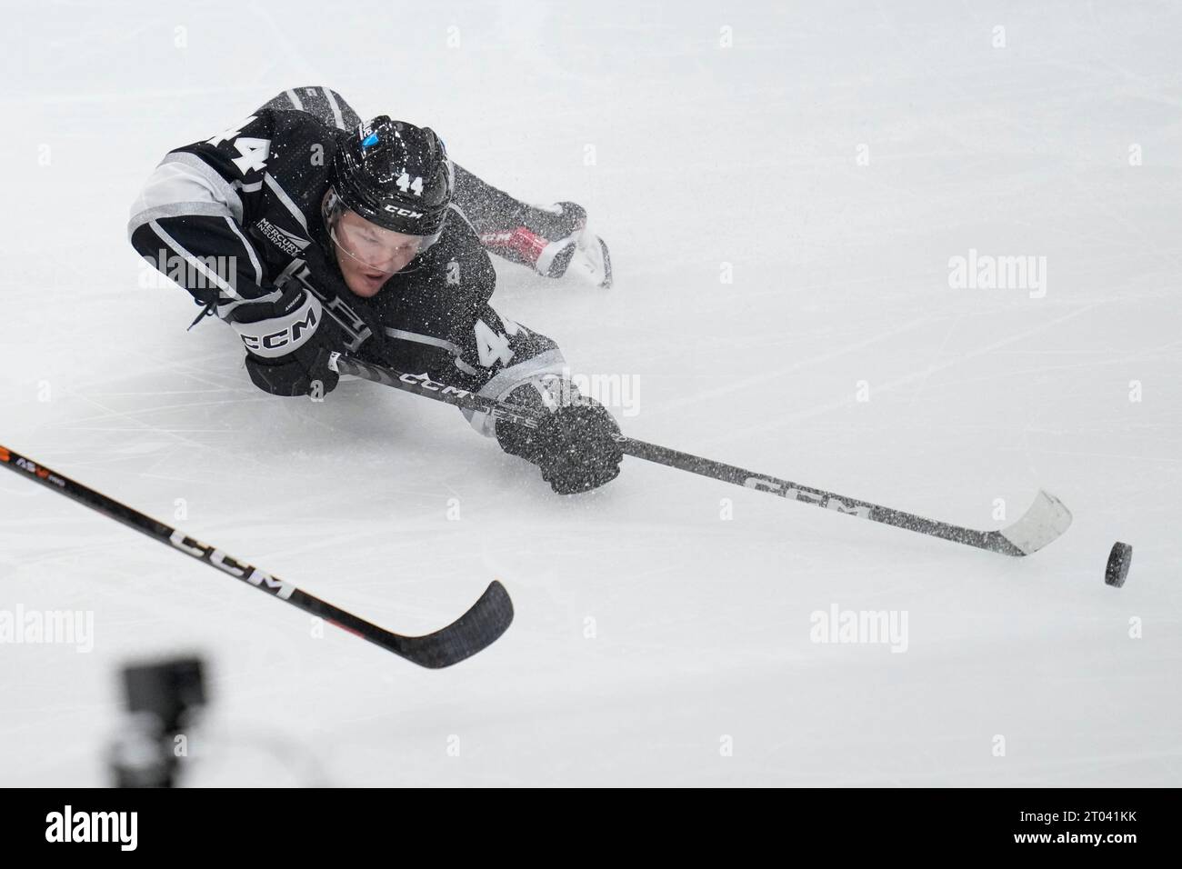 Los Angeles Kings defenseman Mikey Anderson (44) shoots as he falls ...