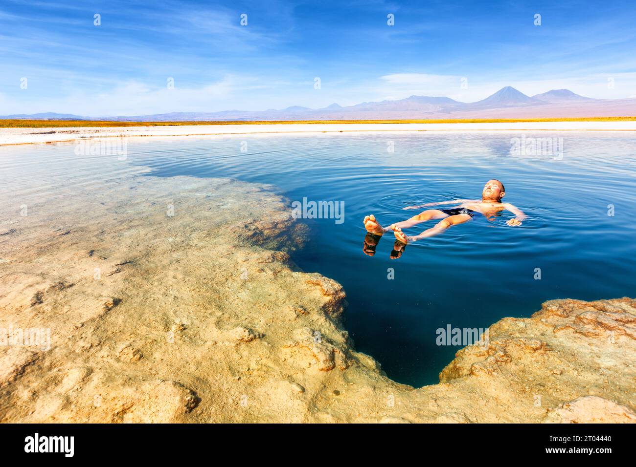 Floating at Laguna Cejar salt lake, San Pedro de Atacama, Chile, South ...