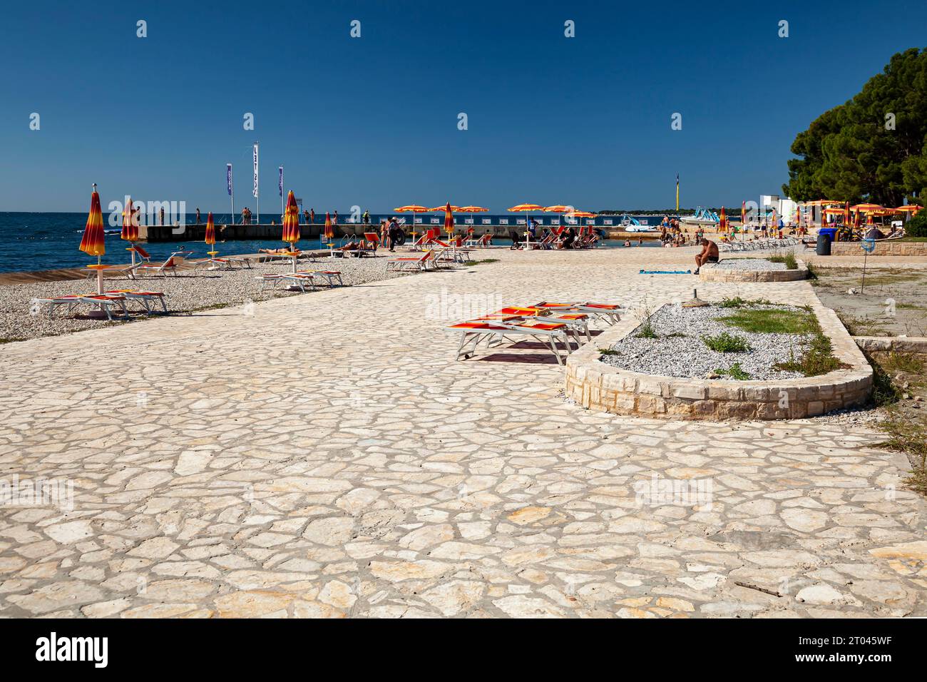 Beach on the stone coast of Spadici, Porec, Istria, Croatia Stock Photo ...