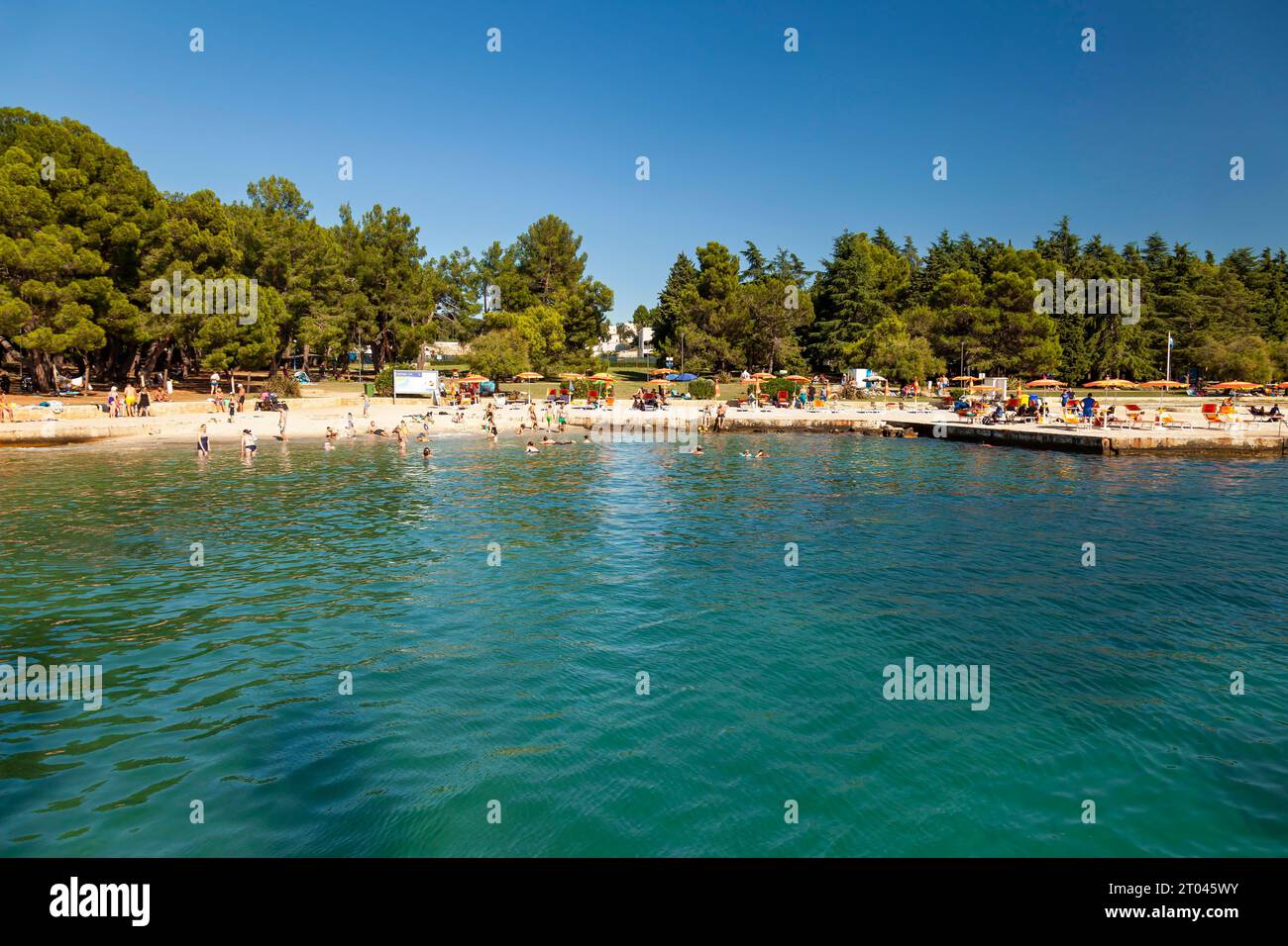 Beach on the stone coast of Spadici, Porec, Istria, Croatia Stock Photo ...