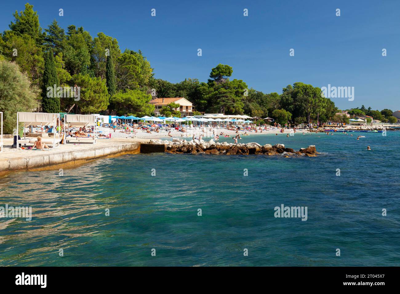 Beach on the stone coast of Spadici, Porec, Istria, Croatia Stock Photo ...