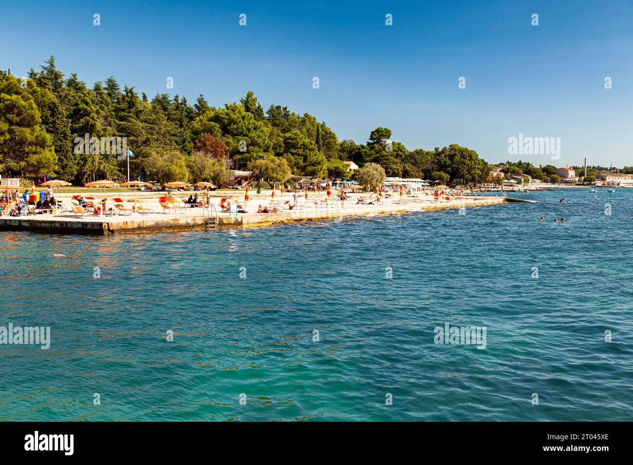Beach on the stone coast of Spadici, Porec, Istria, Croatia Stock Photo ...