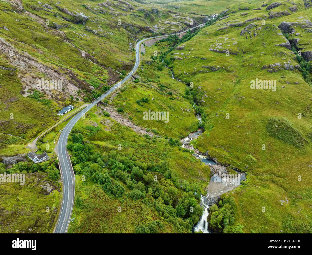 Aerial view of the A82 scenic road through Glen Coe, with the River Coe ...