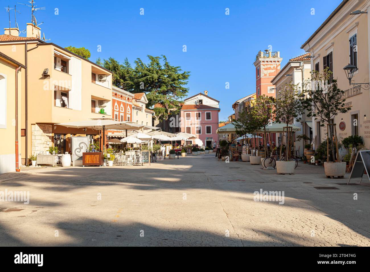 Terraces of restaurants in the historic town centre of Novigrad, Istria ...