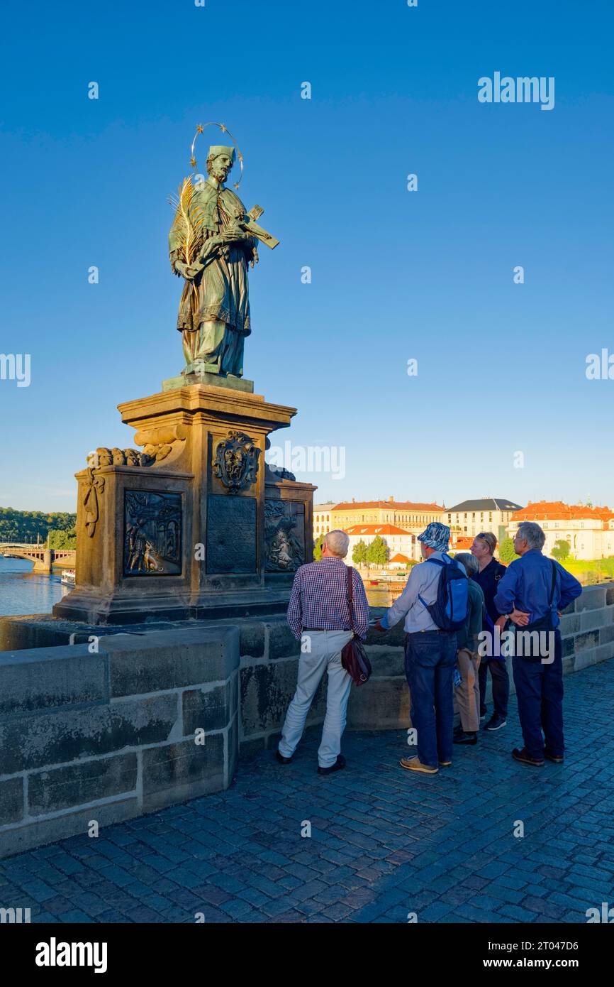 Prague charles bridge statue of st john of nepomuk hi-res stock ...