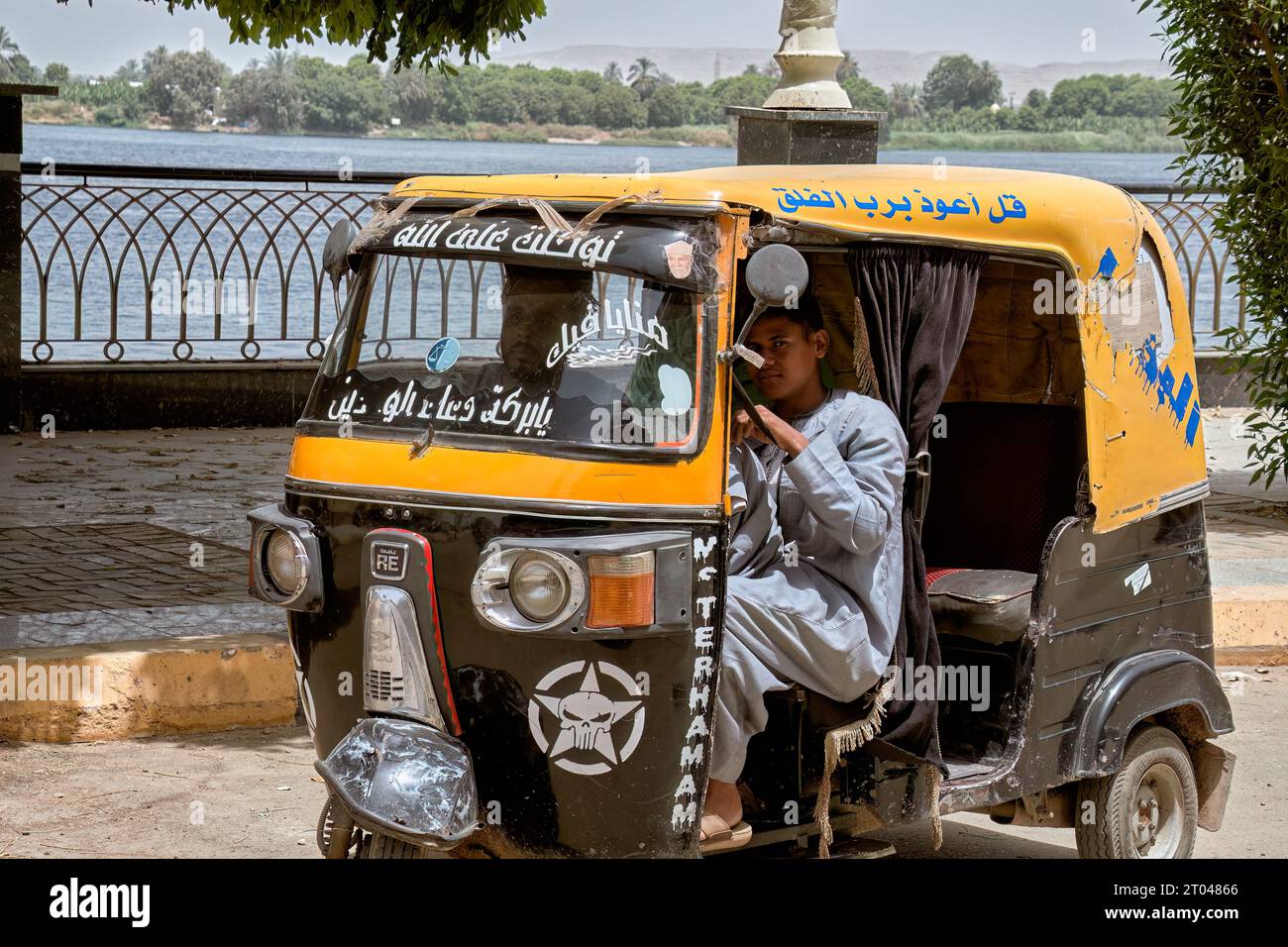 A tuc tuc car on an Arabic street Stock Photo - Alamy