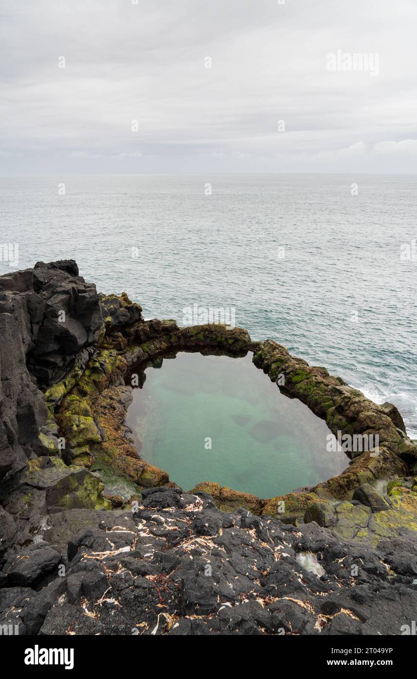The Brimketill lava rock pool in Iceland Stock Photo - Alamy