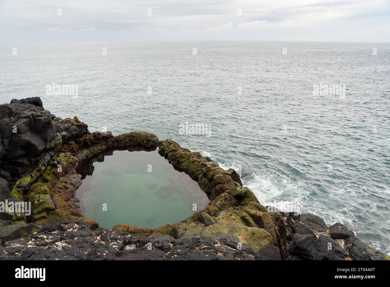 The Brimketill lava rock pool in Iceland Stock Photo - Alamy