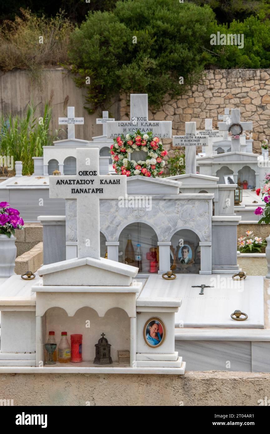 greek cemetery or graveyard with white marble commemorative memorial ...