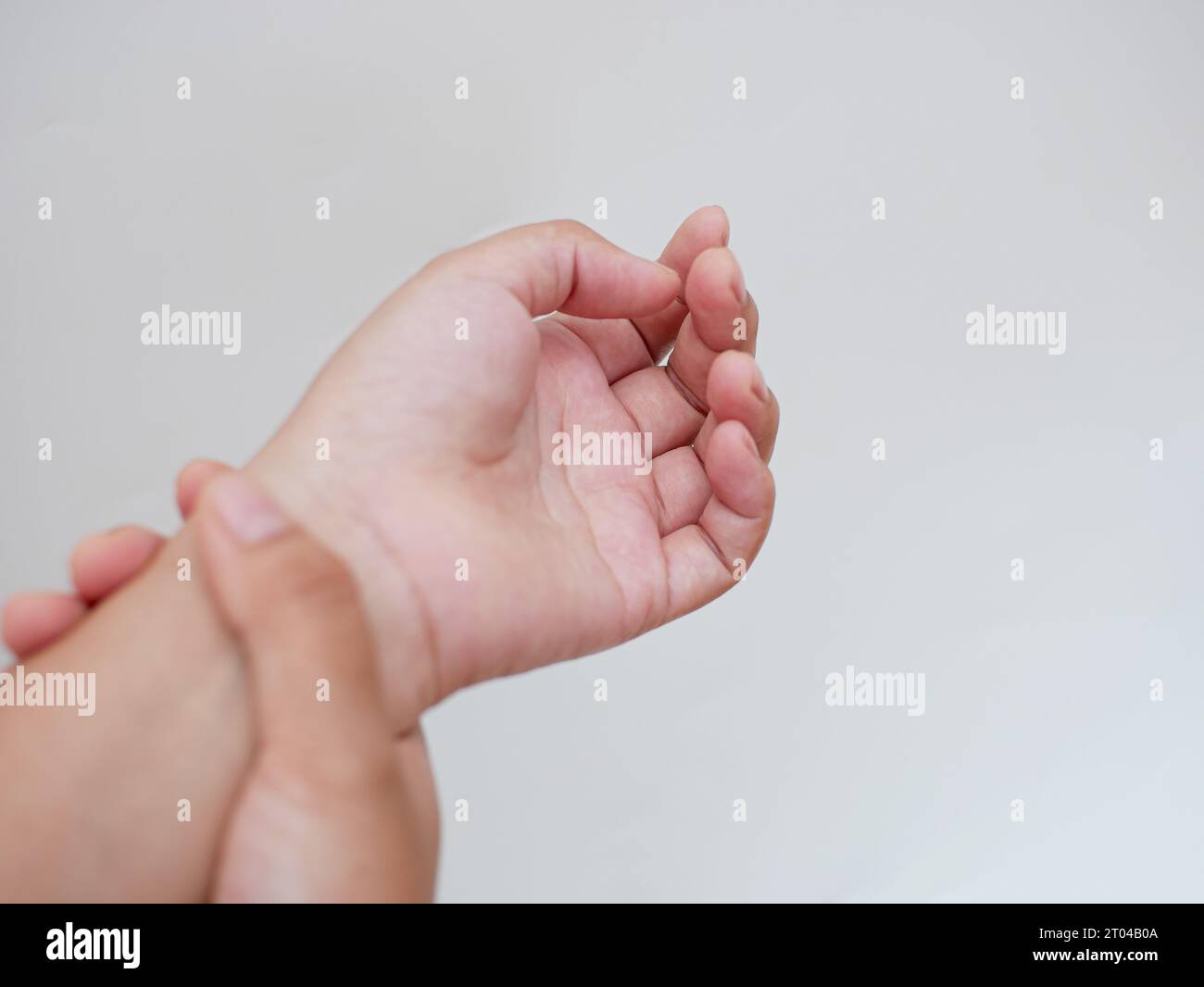 close up woman holding her wrist symptomatic Office Syndrome. health ...
