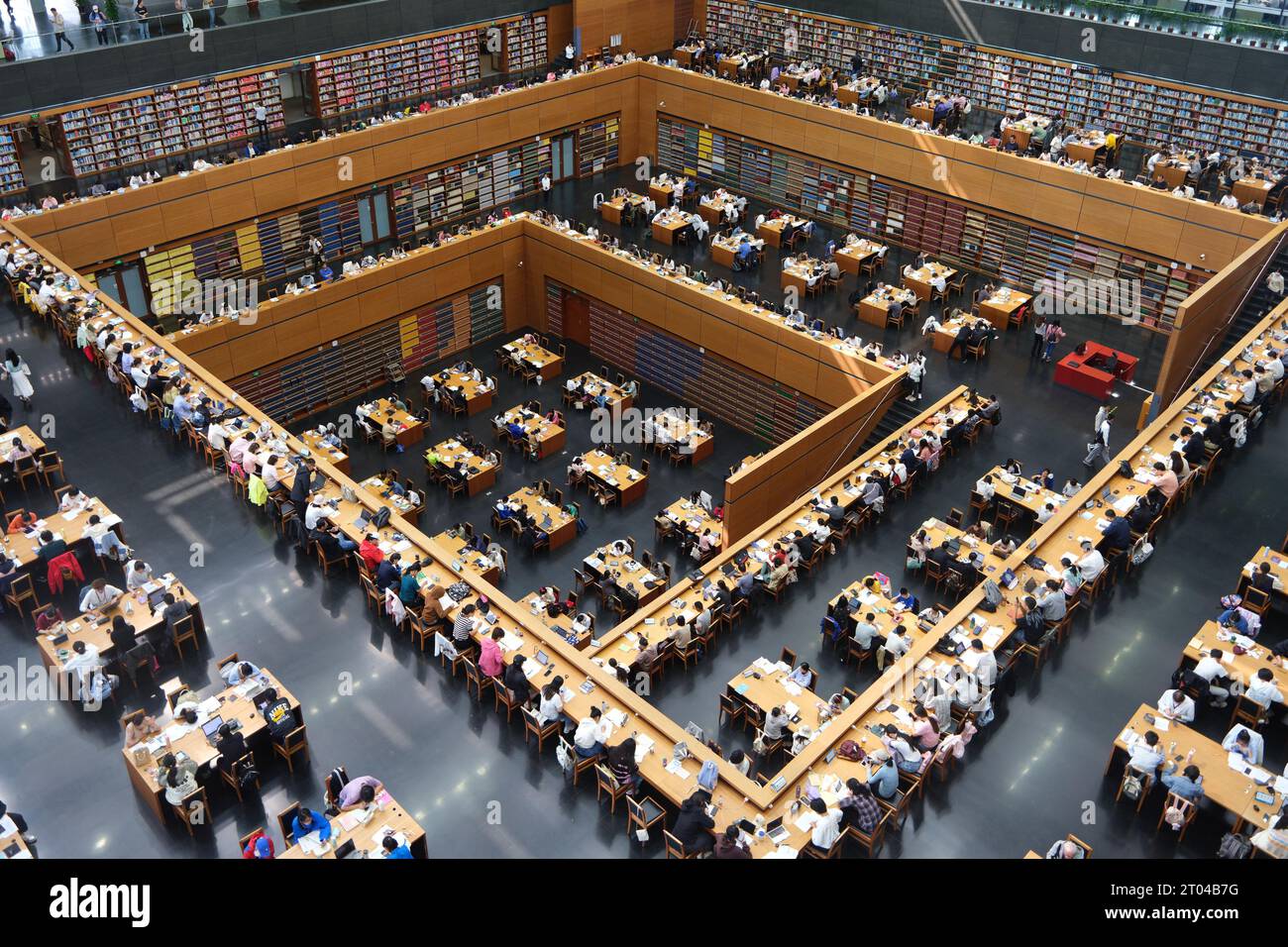 People read books at the National Library of China during the National ...