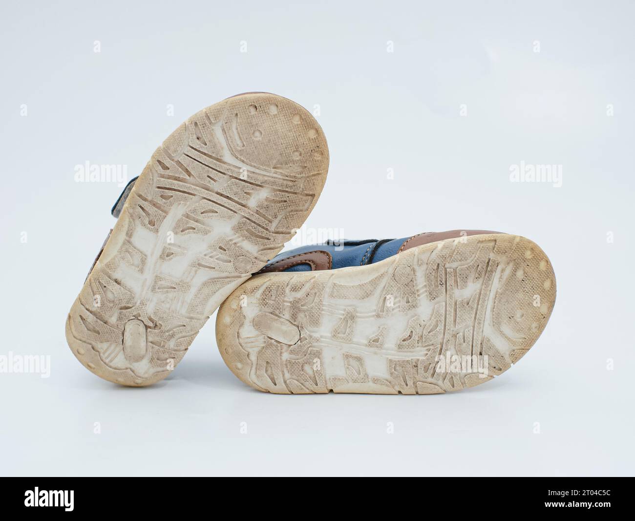 used dirty boy shoes isolated on white Stock Photo - Alamy