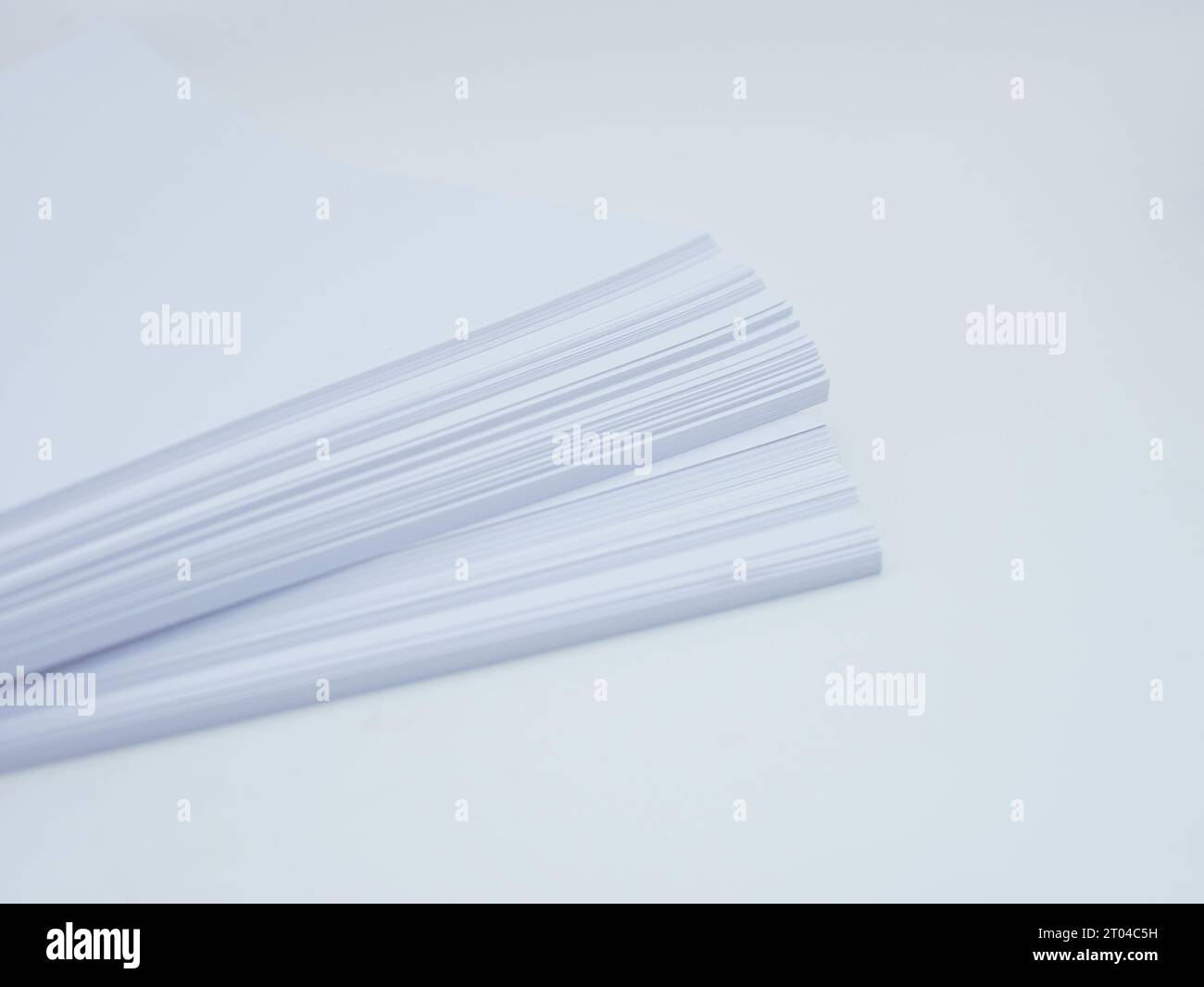 stack white paper isolated on white background Stock Photo - Alamy