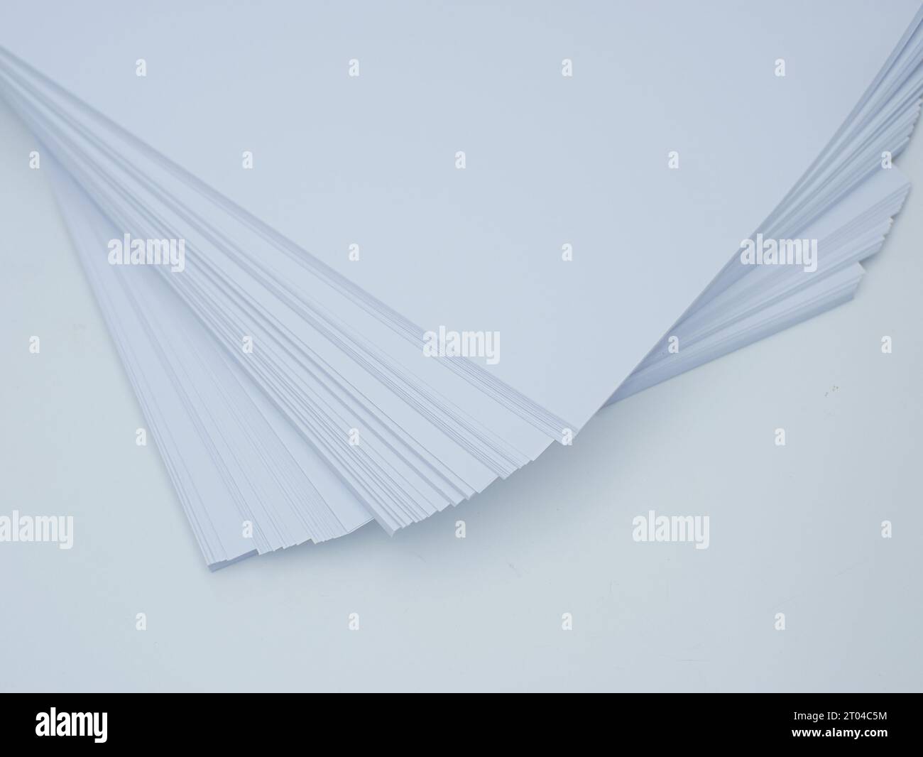 stack white paper isolated on white background Stock Photo - Alamy