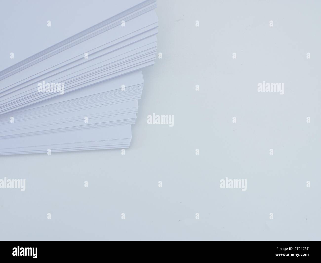 stack white paper isolated on white background Stock Photo - Alamy