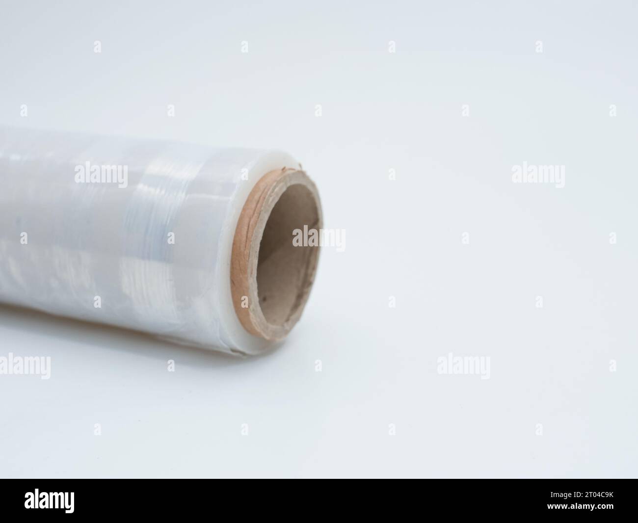 Roll of transparent plastic wrapping on white background Stock Photo ...