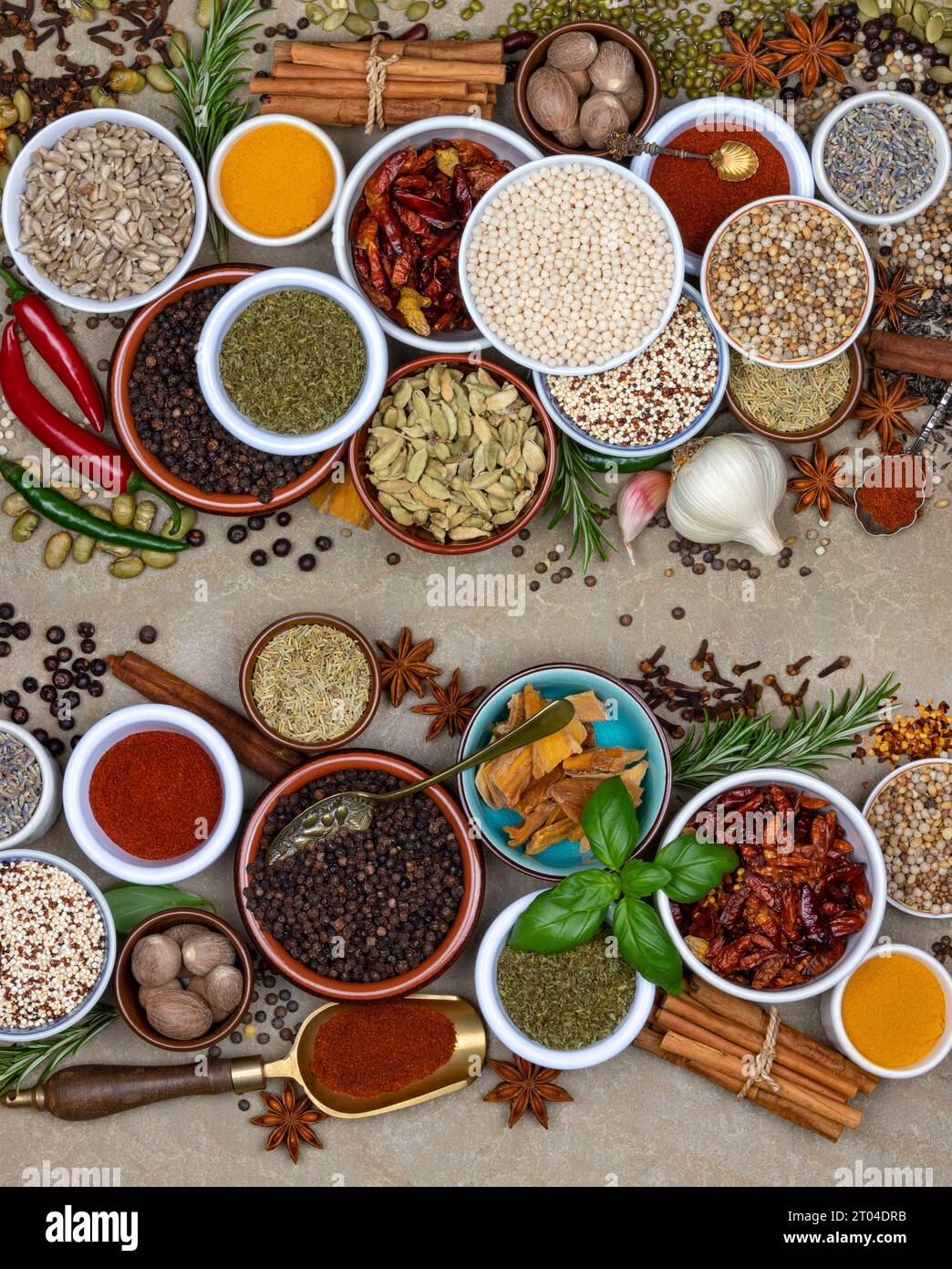 Selection of spices and herbs used to add flavor and seasoning to food ...