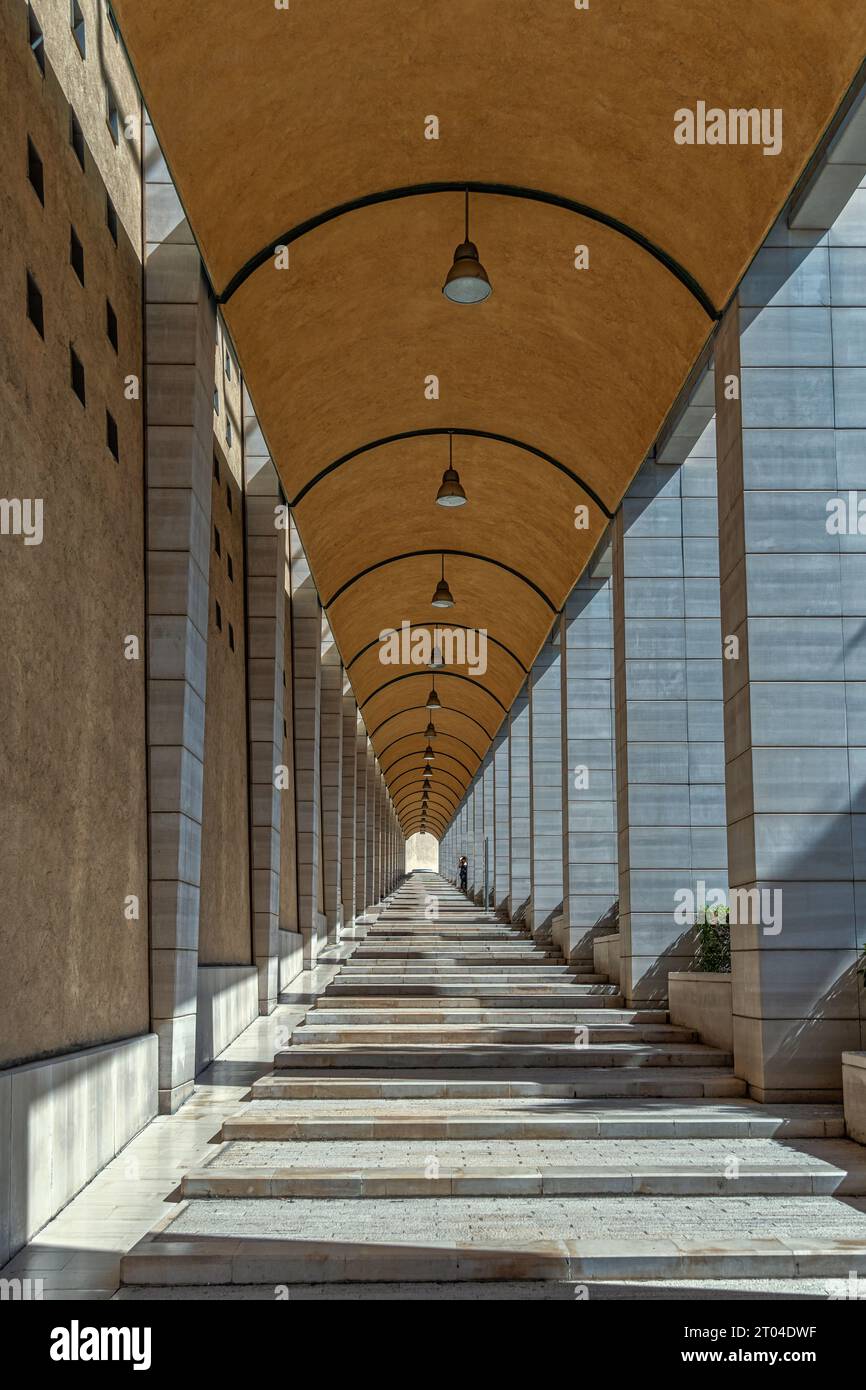 External portico with arches and pillars leading to the churchyard of ...