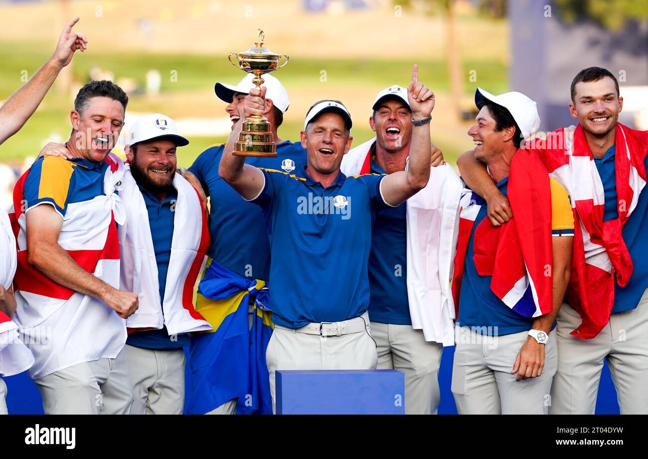 Team Europe Captain Luke Donald lifts the Ryder Cup Trophy after Europe ...