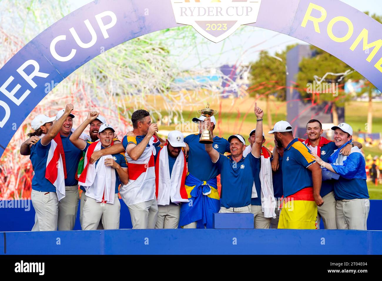 Team Europe Captain Luke Donald lifts the Ryder Cup Trophy after Europe ...