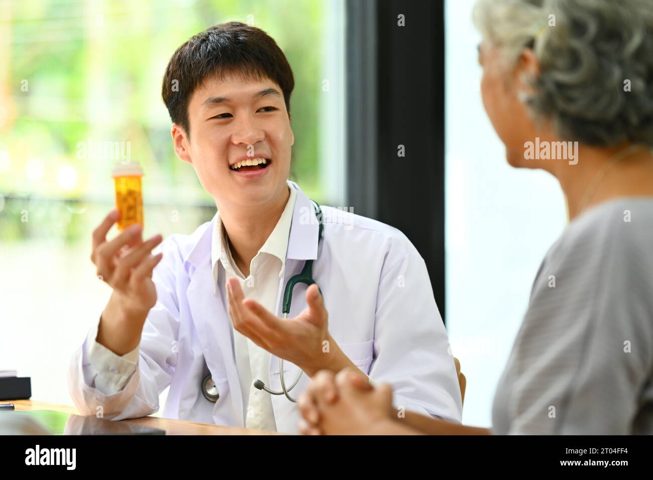 Female doctor explaining medication middle hi-res stock photography and ...