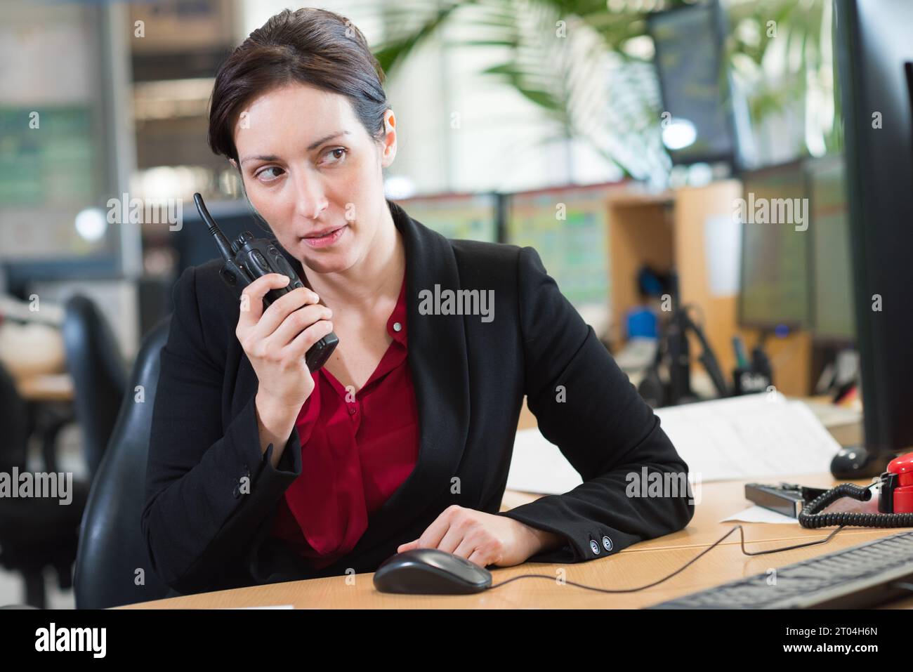 security manager works with walkie talkie Stock Photo - Alamy
