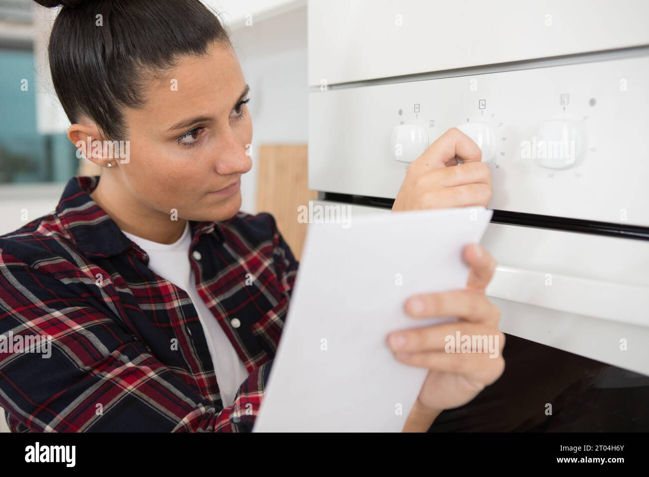 Female customer reading instructions hi-res stock photography and ...